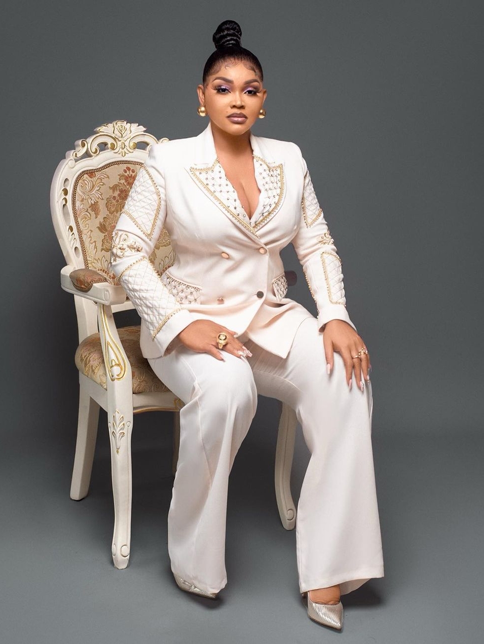 Mercy Aigbe wearing a cream coloured power suit styled By Medlinboss ...