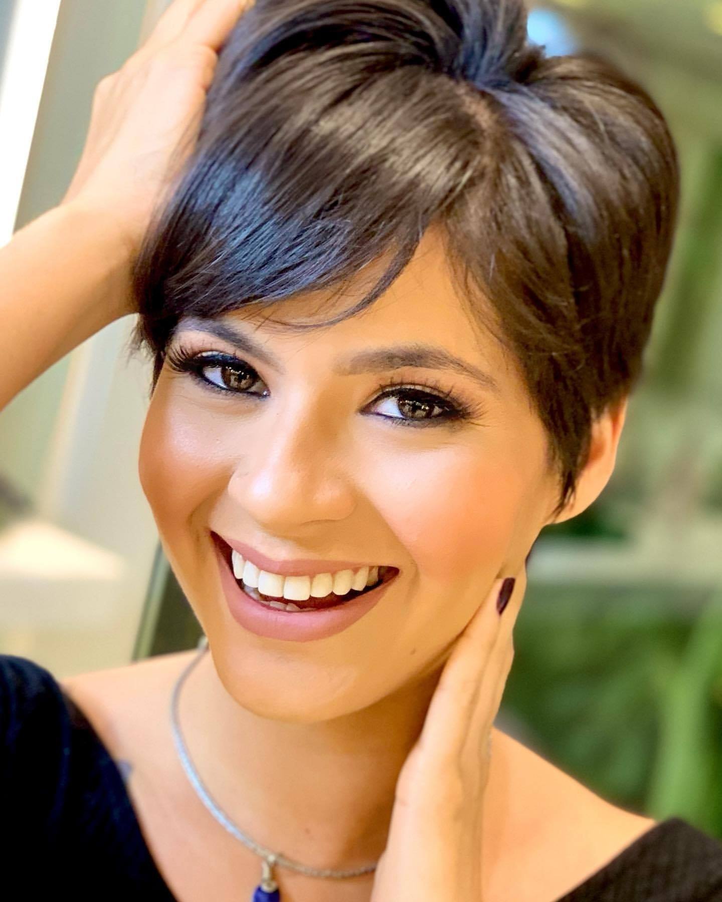 Super model goes to short pixie hair cut - Village Barber Stories