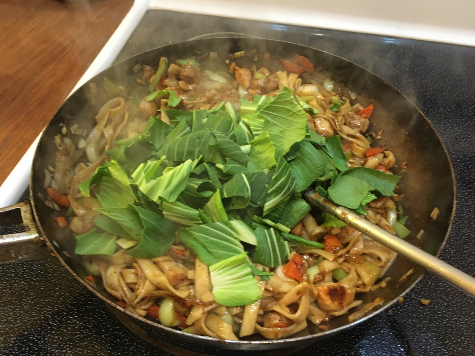 Mystery Lovers' Kitchen: Ginger Chicken Chow Fun #Recipe by Leslie Karst