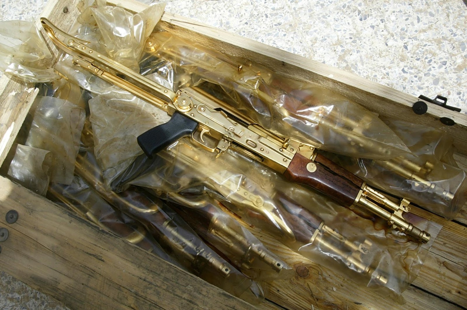 Gold weapon's Saddam Hussein's AK 47 Gold Platted - Gold Information Blog