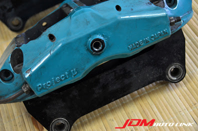 JDM Auto Link: Project Mu 4 Pot Calipers with Slotted Rotors - FD3S RX-7
