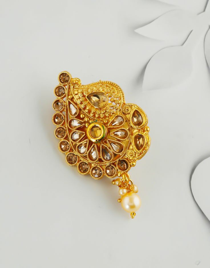 Golden saree pins jewellery