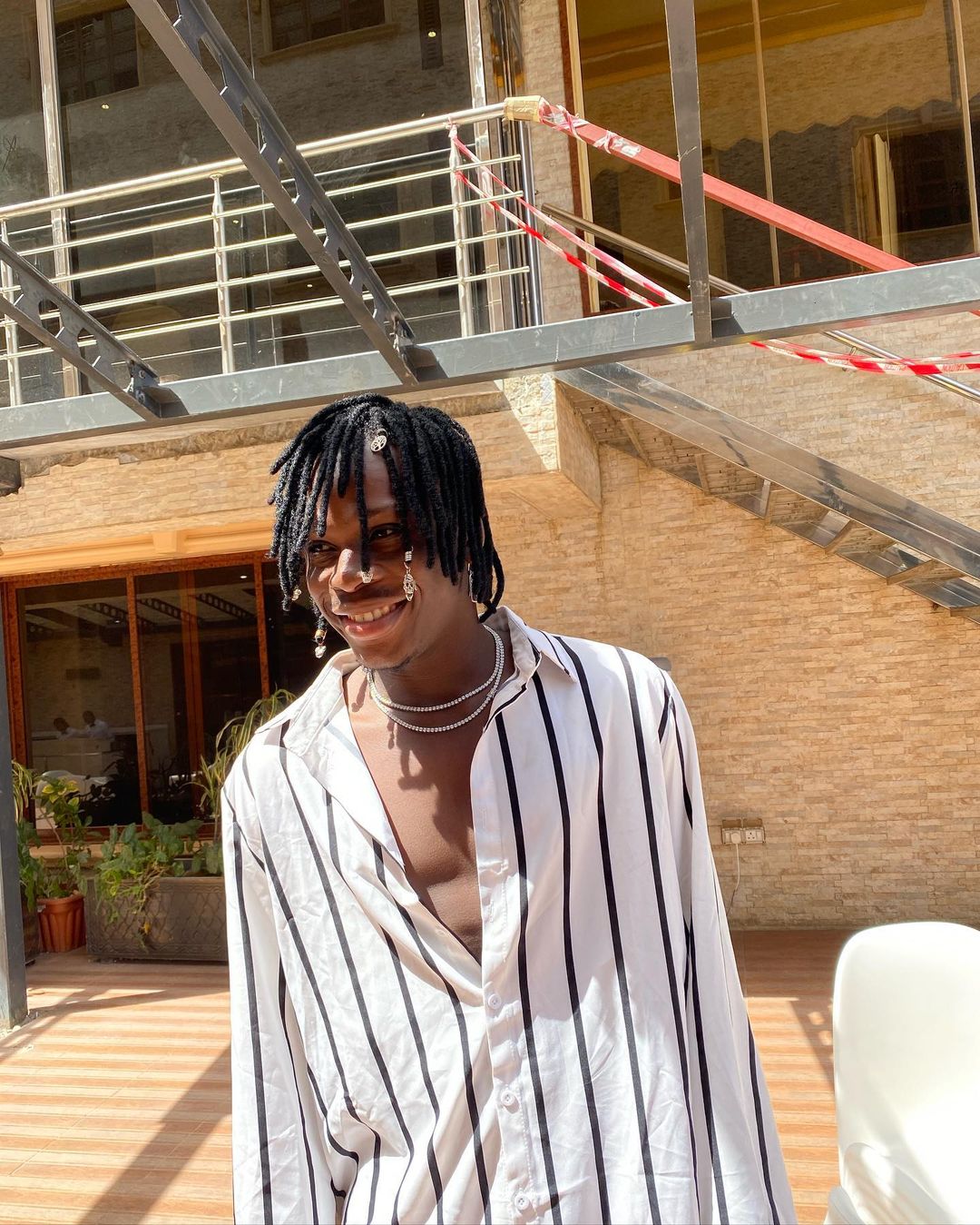 Pictures of Fireboy DML Hairstyle