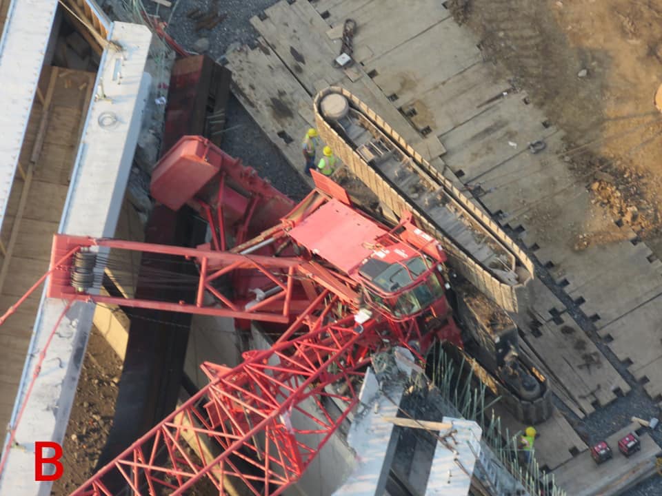 Industrial History: Crane fell over while putting a steel beam on a new ...