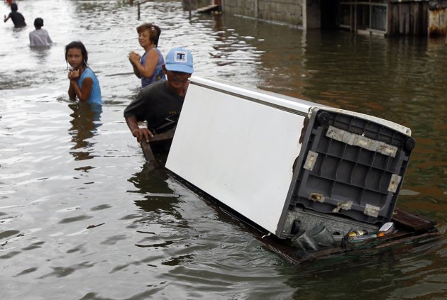 Storm surge leads to floods. (Typhoon GENER ~ International name ...