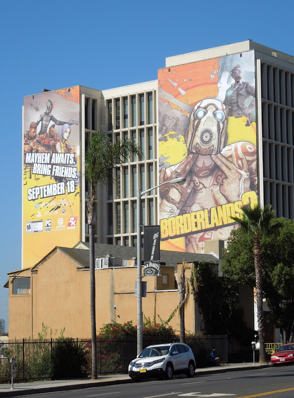 bridesmaids movie: Giant Borderlands 2 video game billboards...