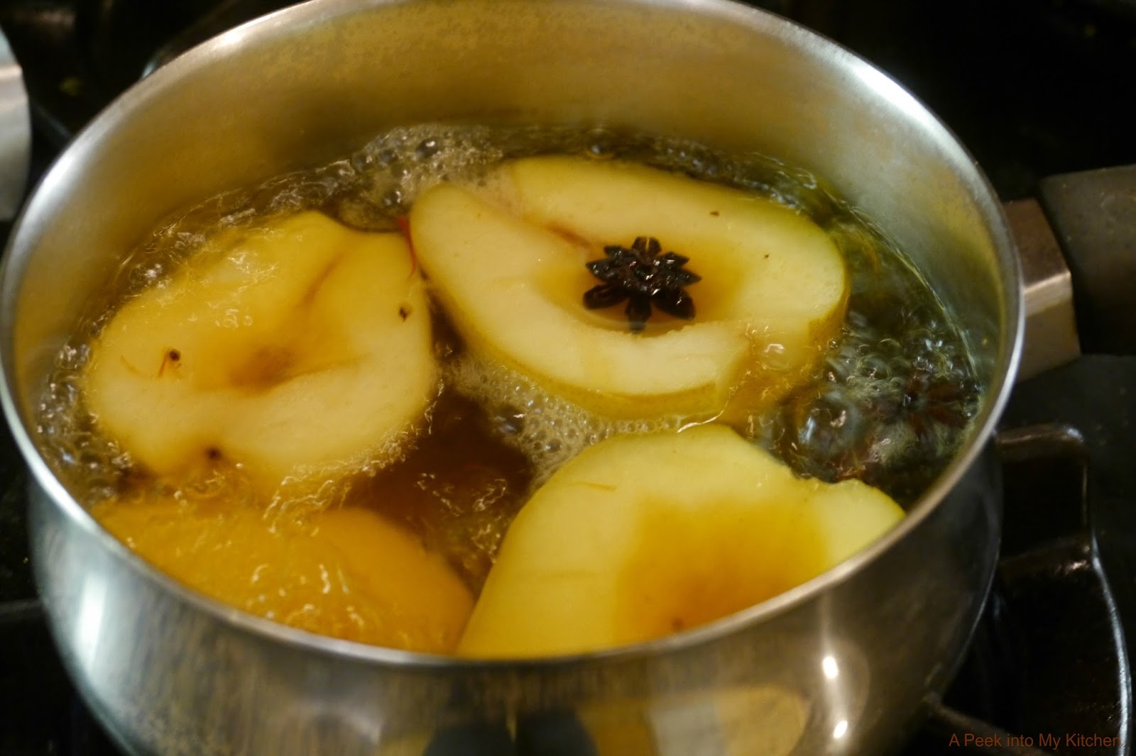 A Peek into My Kitchen: Poached Pears in Palm Jaggery Syrup and Coconut ...