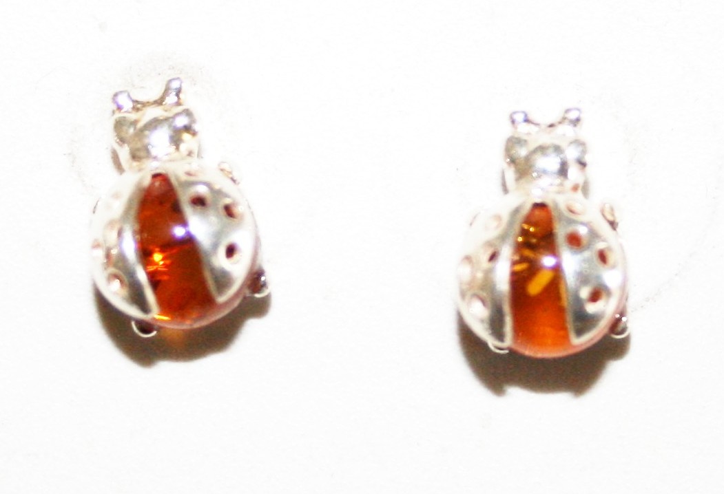 Ámbar del Báltico: Animales de ámbar y plata de ley.