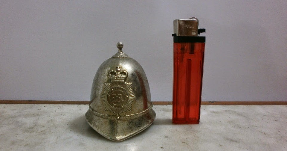 Antikpisan: Lonceng Berbentuk Miniature Topi Polisi Eropa