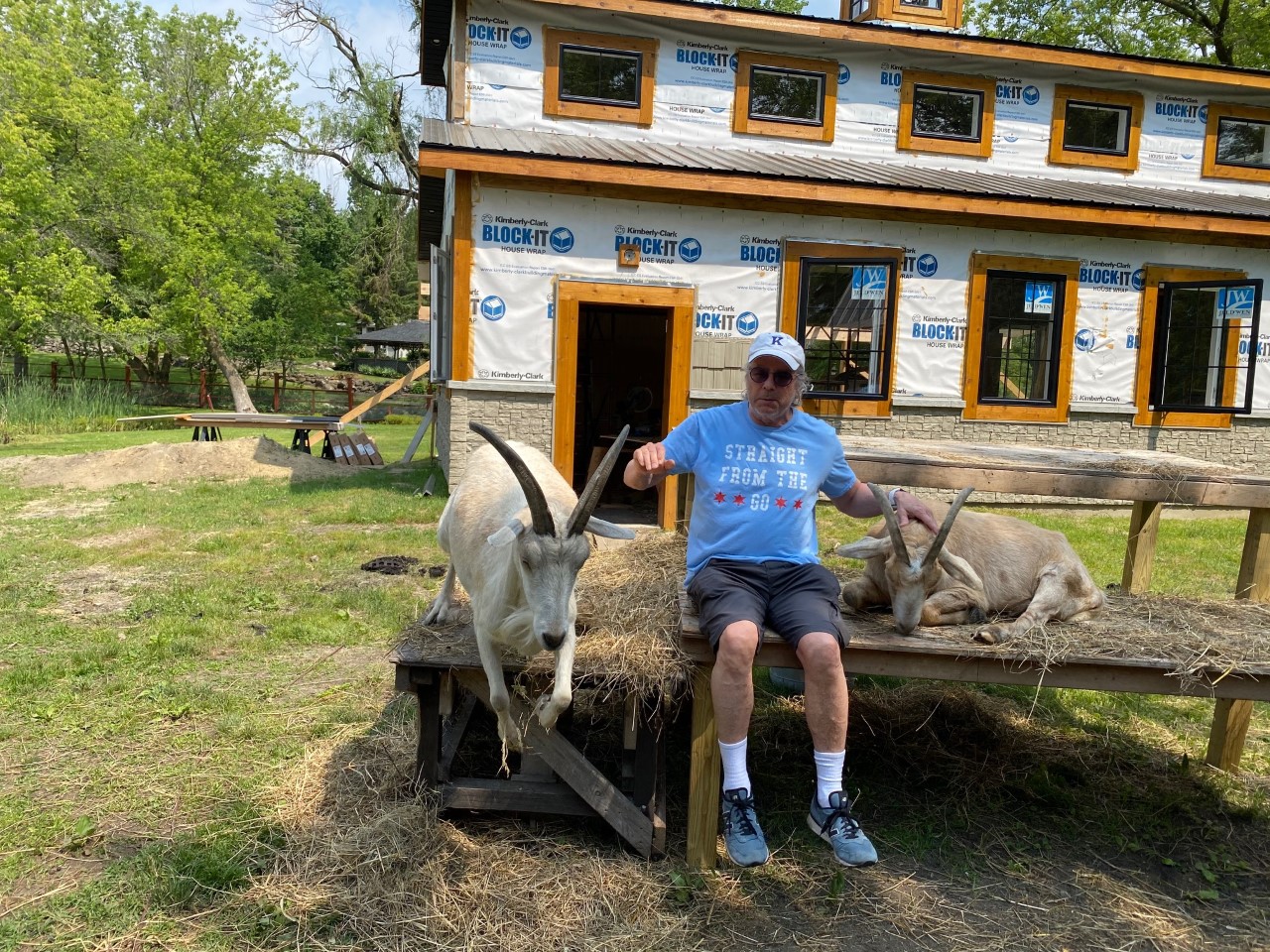Hindsight : VISITING WITH SEVERAL OF THE GUESTS IN MIKE'S NEW GOAT HOTEL