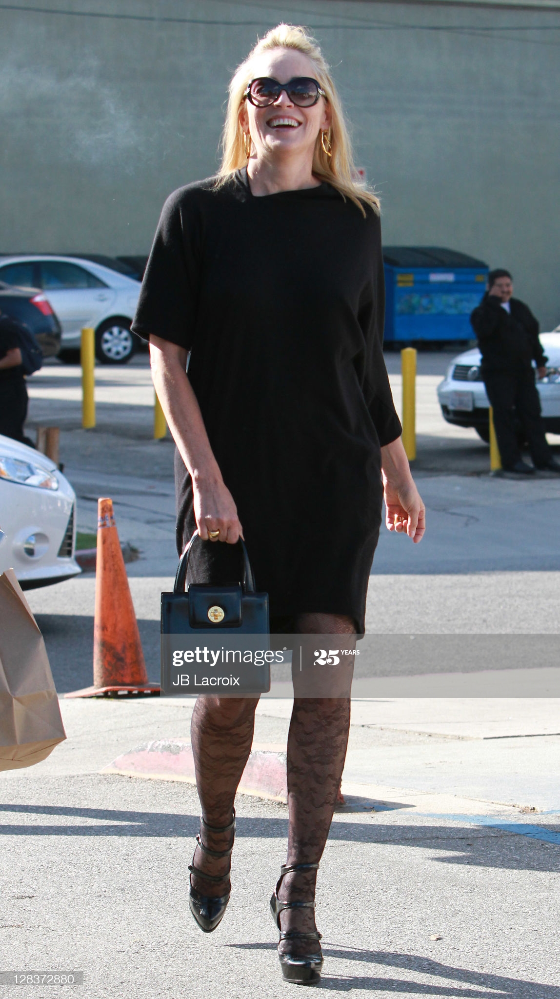 Celebrity Legs and Feet in Tights: Sharon Stone`s Legs and Feet in Tights 4