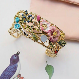 Golden broad bracelets