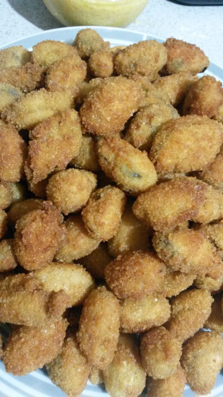 curcubeu culinar: Midii pane și sos picant