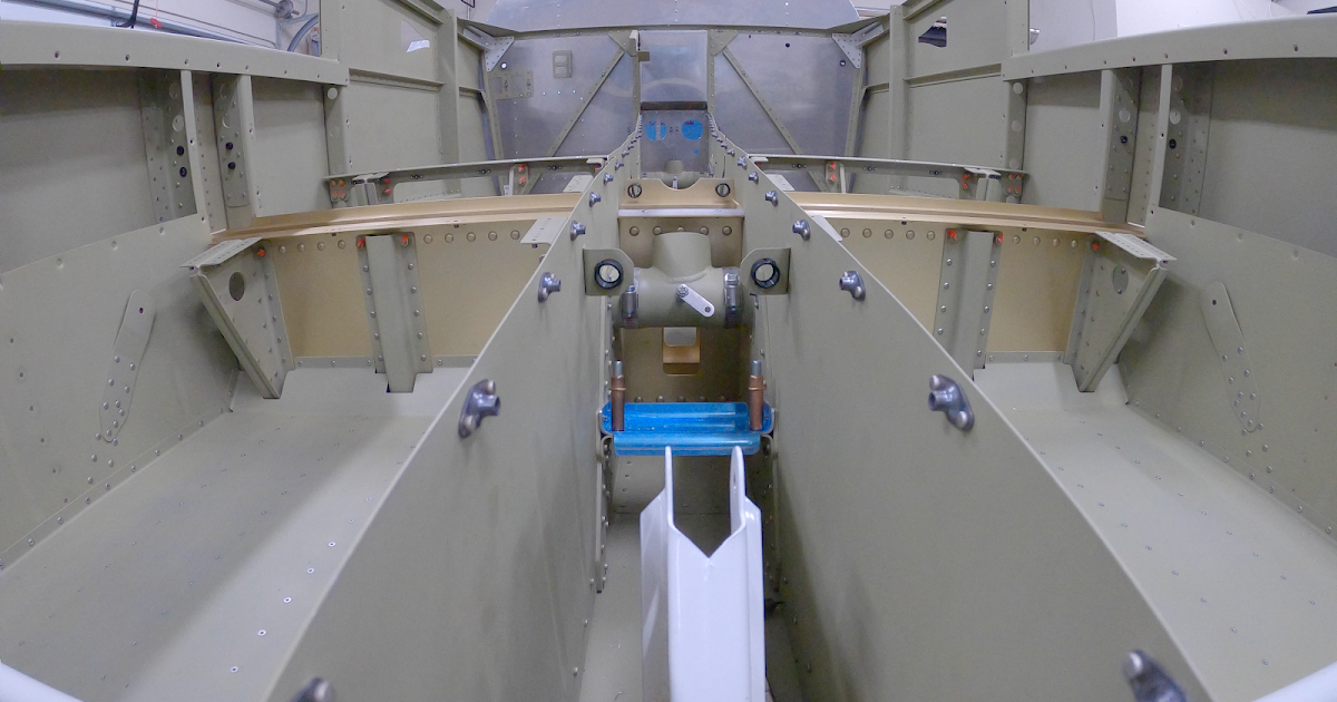 Damazio family's RV-10 project: Mid-fuselage ribs and bottom skins complete