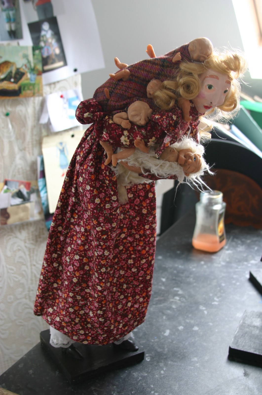 Mummer Dolls: Slick Slack babies on her back