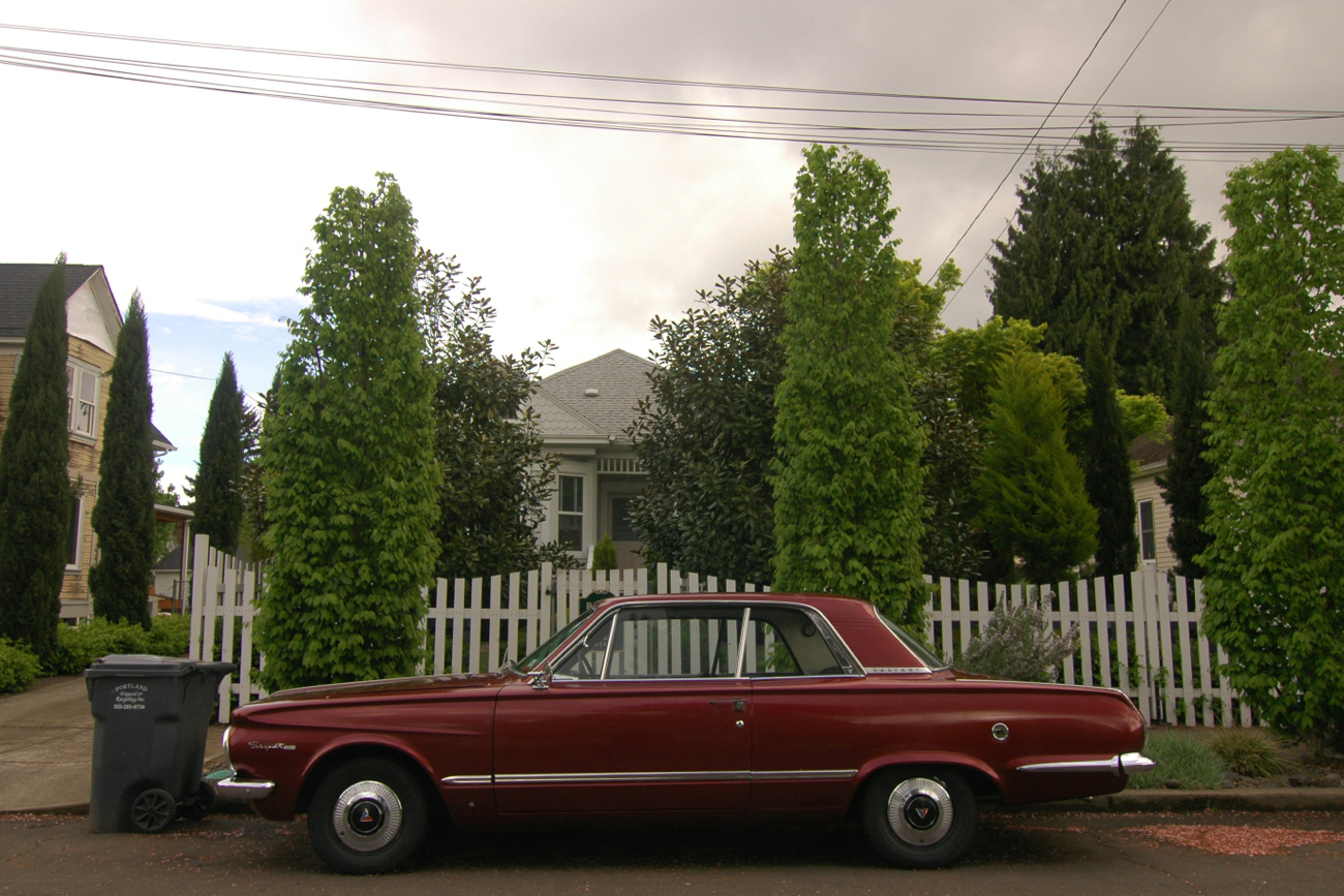 OLD PARKED CARS.: 1964 Plymouth Valiant Signet 200.