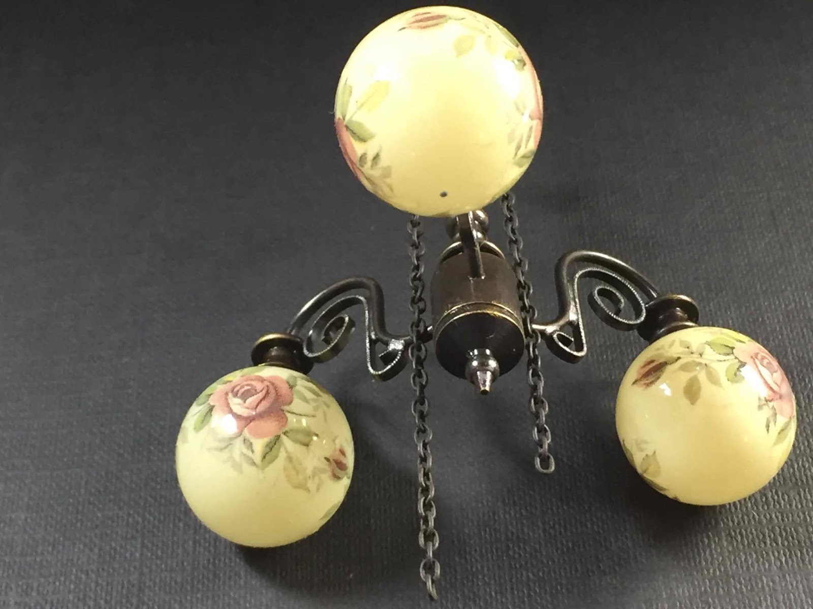 Ray Storey three arm pendant lights