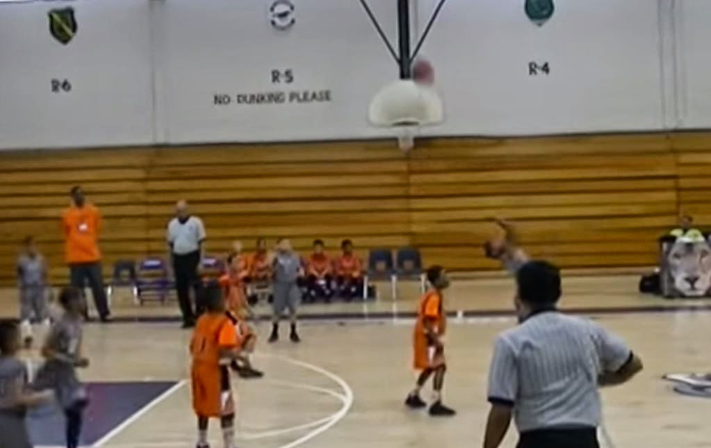 the other paper: Third-grader banks in a no-look backwards 3-pointer at the buzzer (VIDEO)