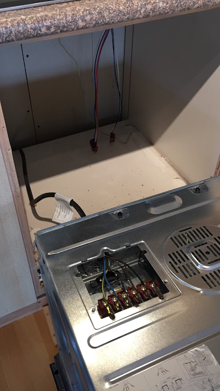 Engineer in Athens: Installing a new induction hob to replace a ceramic ...