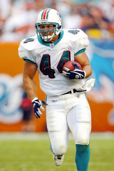 the other paper: Former Miami Dolphin, Rob Konrad swims 9 miles to ...