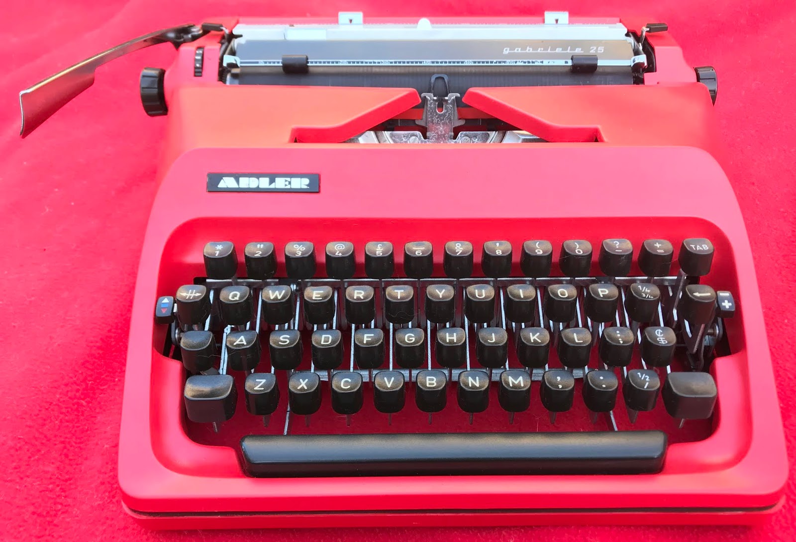 oz.Typewriter: The Poppy-Red Portable Typewriter