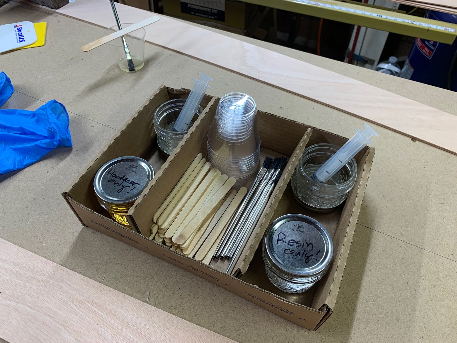 Small batches of WEST System Epoxy using marked syringes