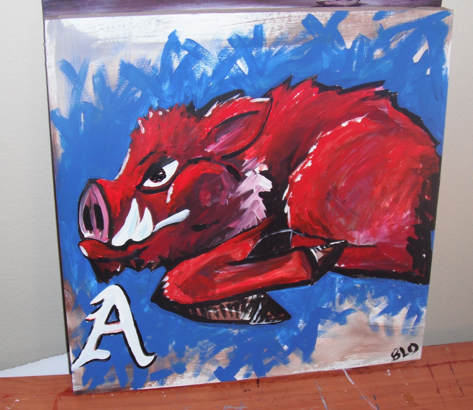 Brittney Owens: Man cave Art: Arkansas Razorbacks