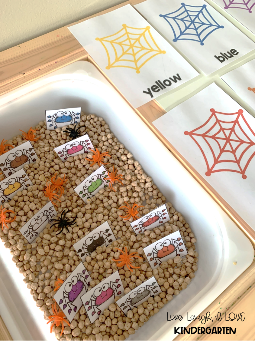 I added the colored spiders to a sensory bin with other plastic spiders.