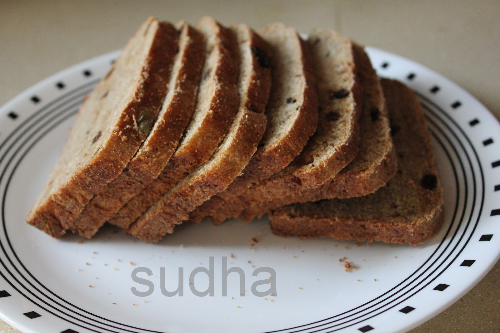 Avial n Rasam: Whole Wheat, cornmeal and raisin ~ Vegan bread