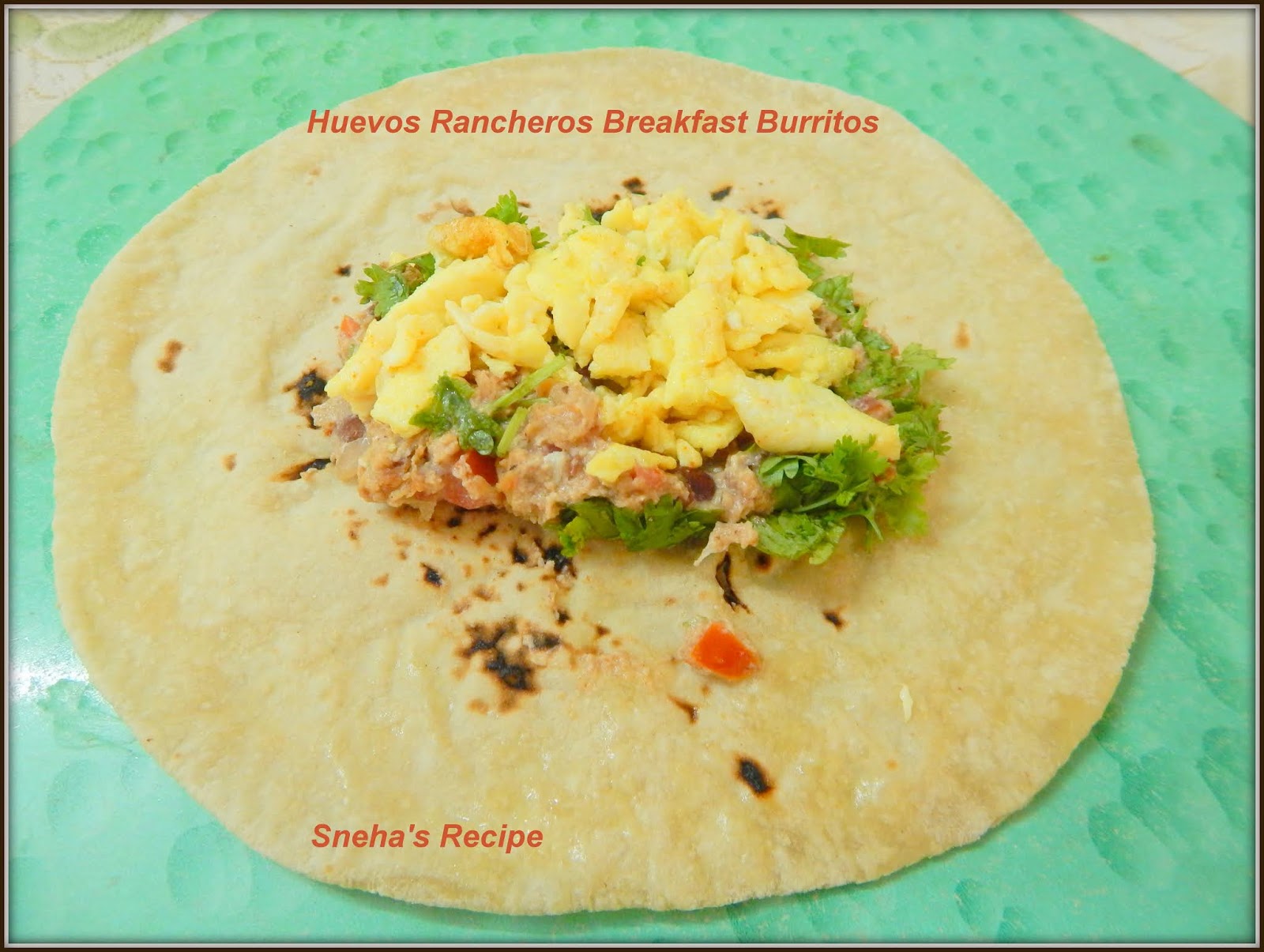 Huevos Rancheros Breakfast Burritos - Sneha's Recipe