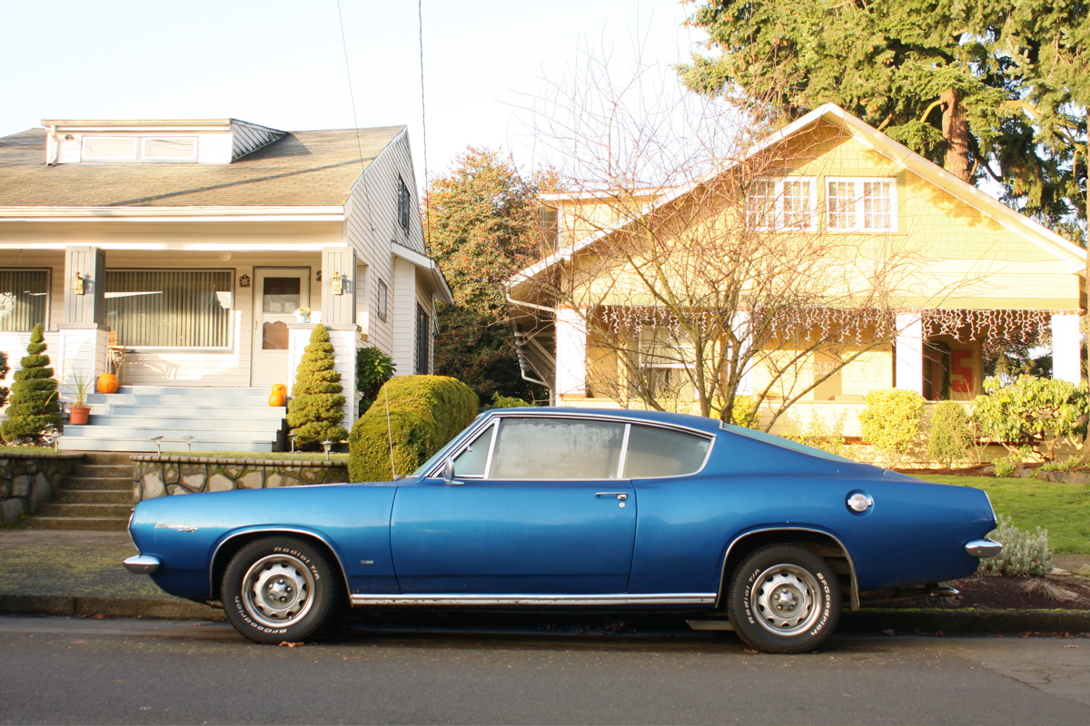 OLD PARKED CARS.: 1967 Plymouth Barracuda.