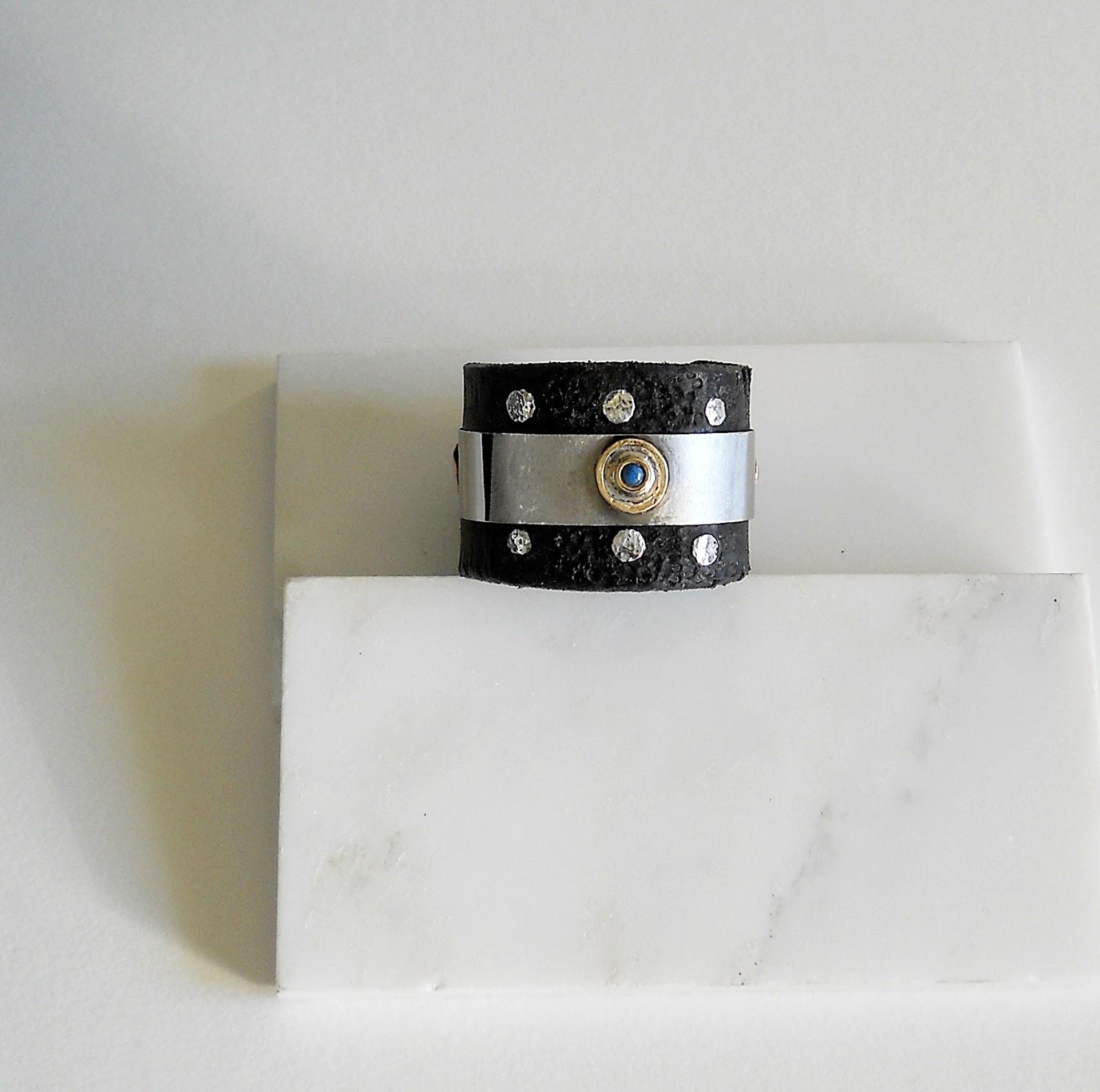 metalsmithing by W.Schweizer: spring steel and leather bracelet