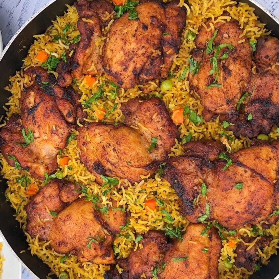 chicken and rice with a cucumber and yogurt salad