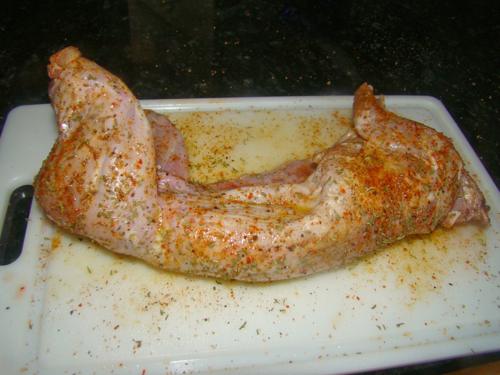 HRM CREATIVE BBQ: Bacon wrapped Rotisserie Rabbit on the BBQ