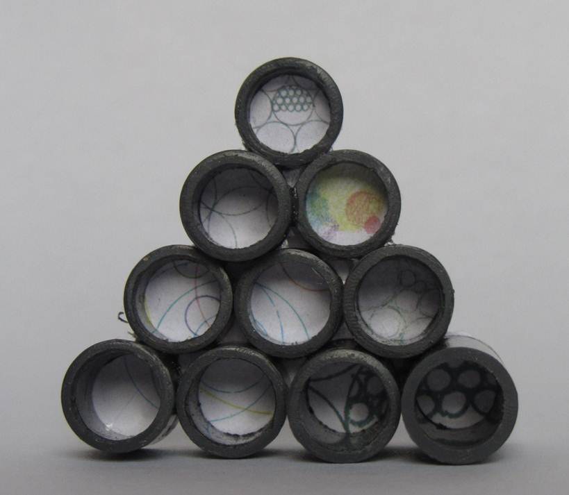 Mabel Lowman Art: Repeating pattern with found objects.