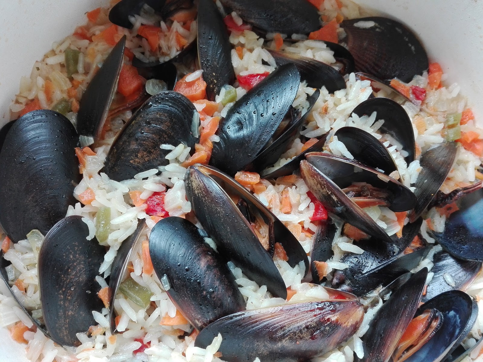 COCINA CHILENA E INTERNACIONAL NORMA: ARROZ CON CHORITOS EN SU CONCHA.