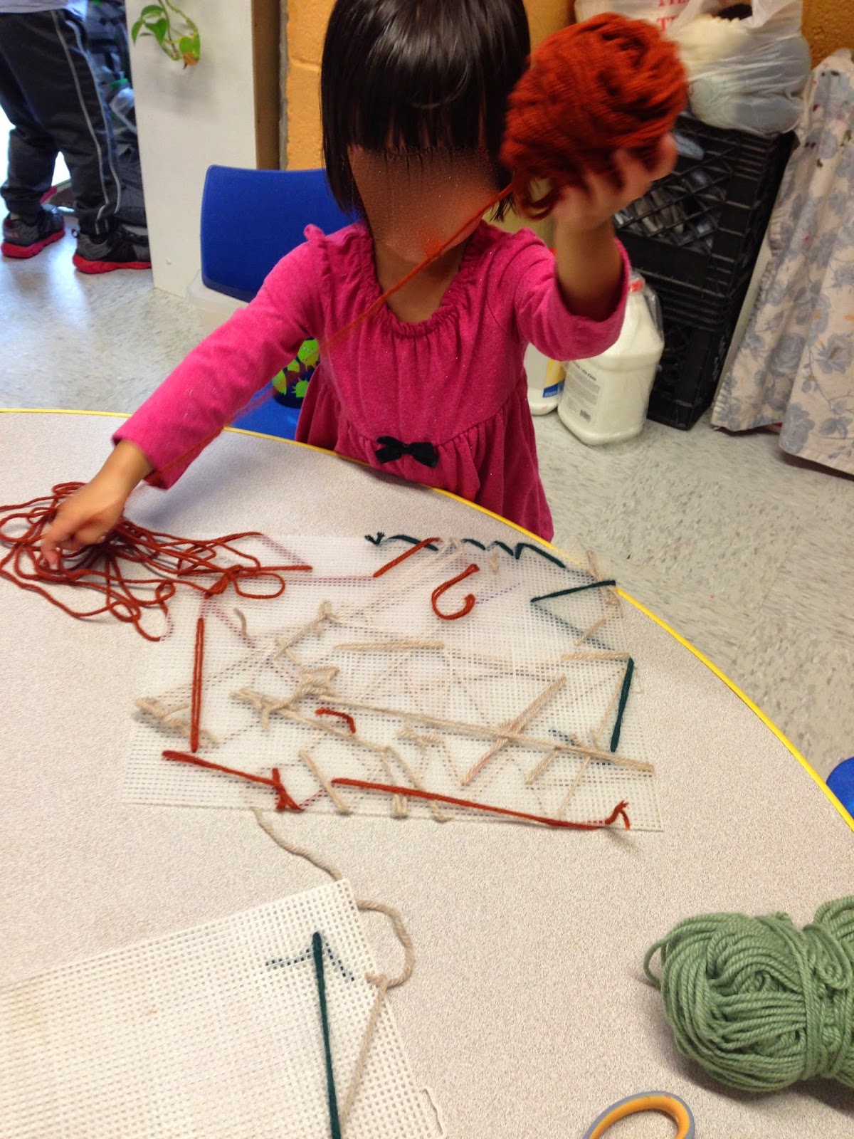 Pondering Preschool: What can we do with yarn?