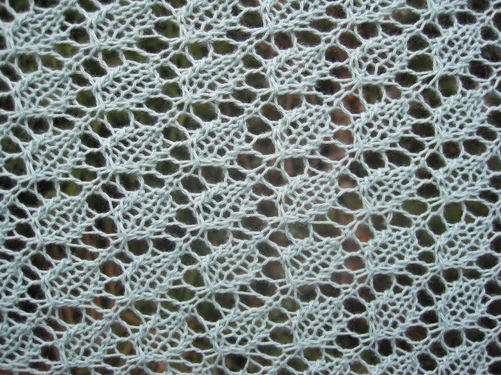 Tam-O'-Banter: Enlarging Swallowtail Lace Shawl by Evelyn Clark