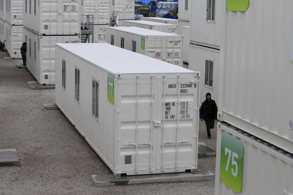 Migrant Crisis : A migrant shelter made from containers - World Politics