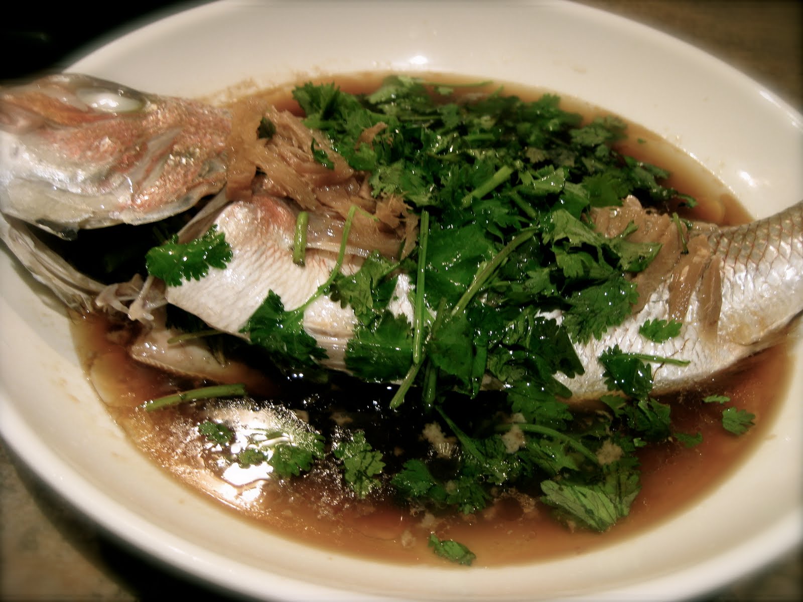 Cook: Chinese steamed fish with ginger and light soy sauce