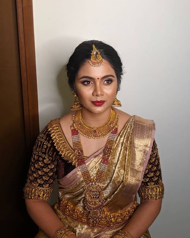 Bride in Ruby Haram Nakshi Vaddanam - Jewellery Designs