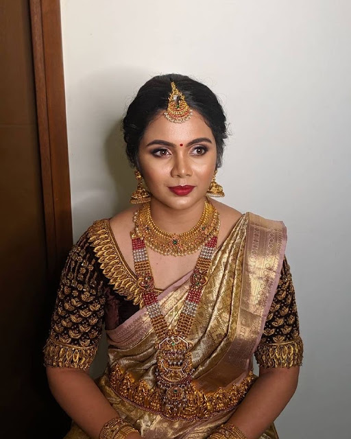 Bride in Ruby Haram Nakshi Vaddanam - Jewellery Designs