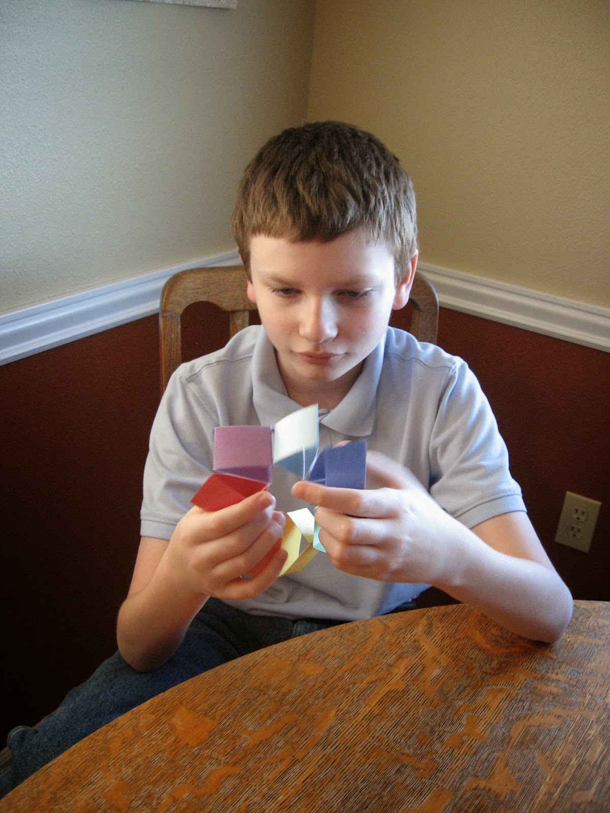 Almost Unschoolers: Amazing Paper Triangle Toy