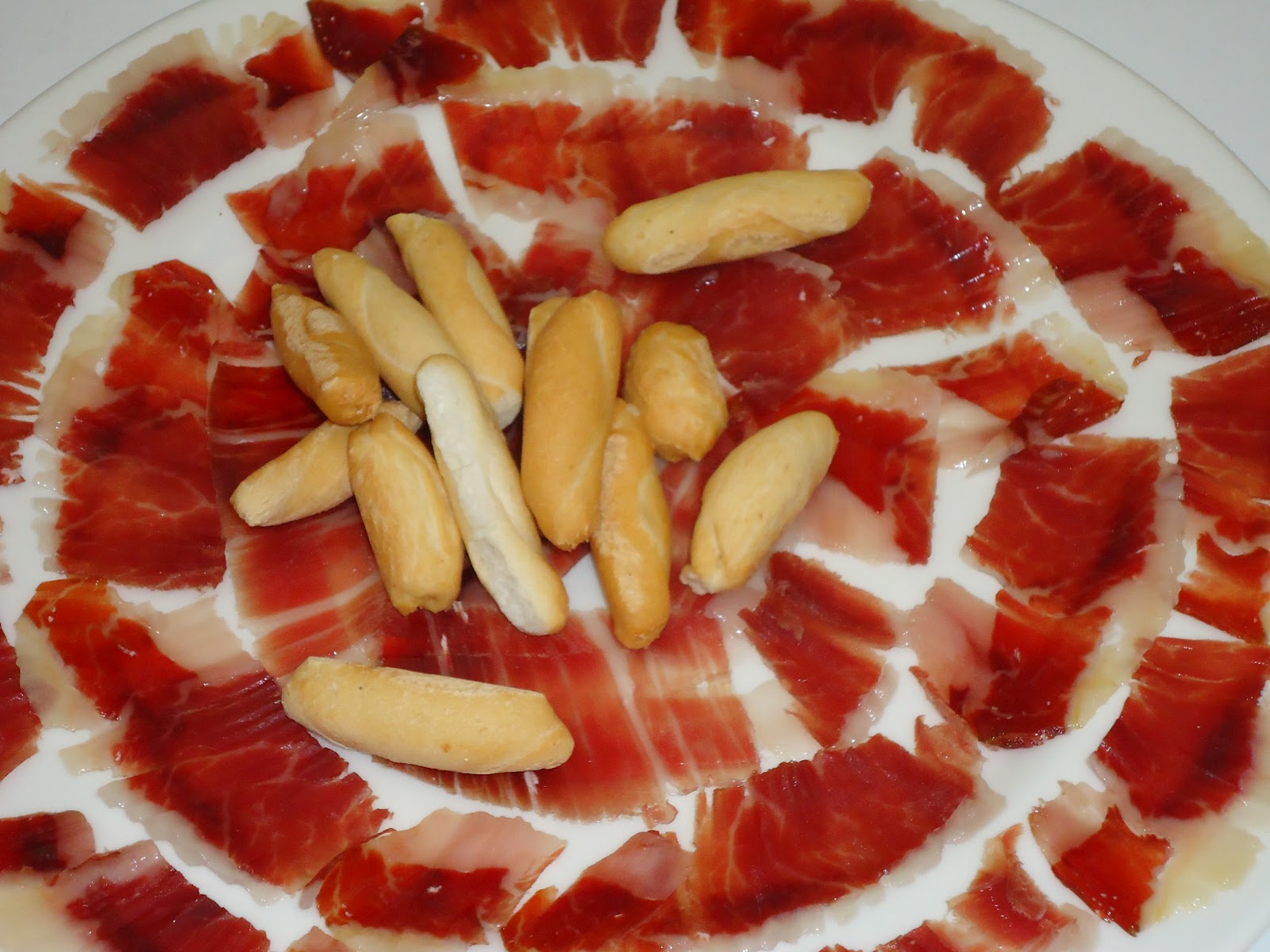 Calzada+cortador+jamón.: El plato de jamon iberico