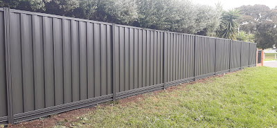 Ironman Fencing: Metroll Metline Colorbond fence with steel Gram plinth