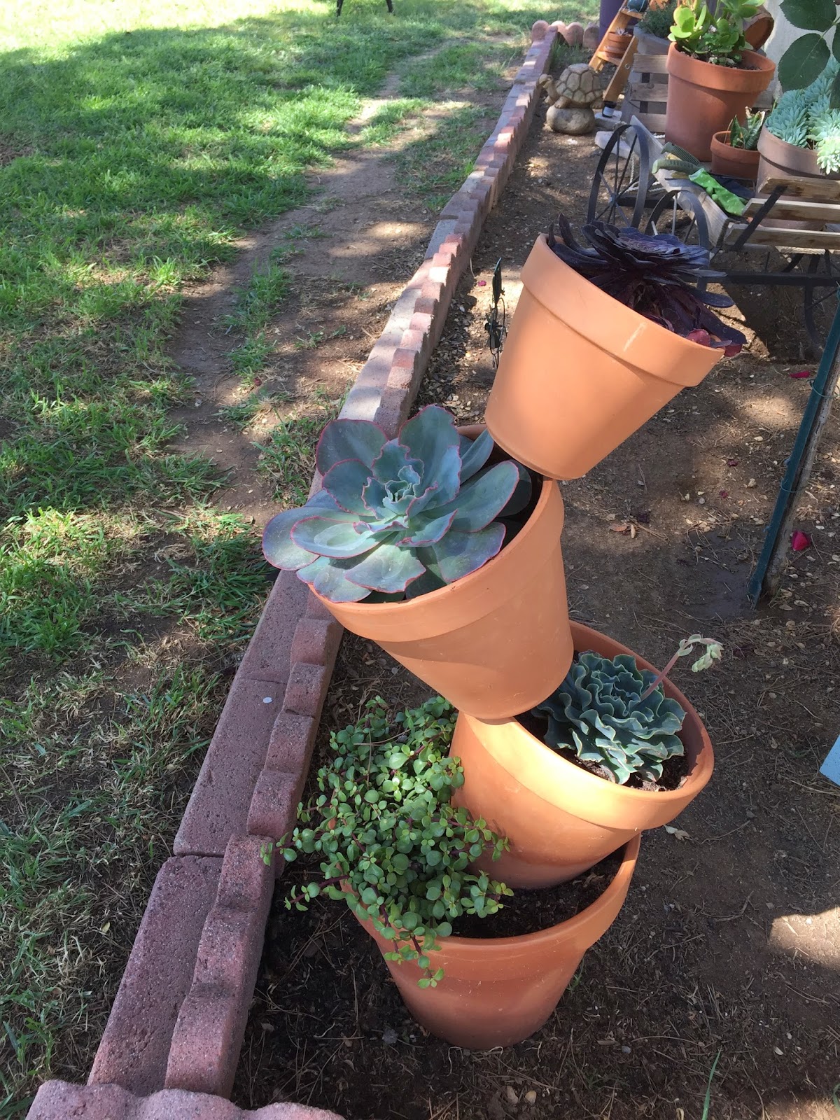 kimmie's craft corner: My attempt at the tipsy pots planter pole