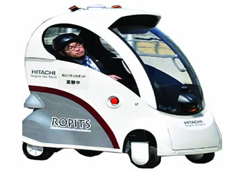 Japan unveils single-passenger car that drives itself
