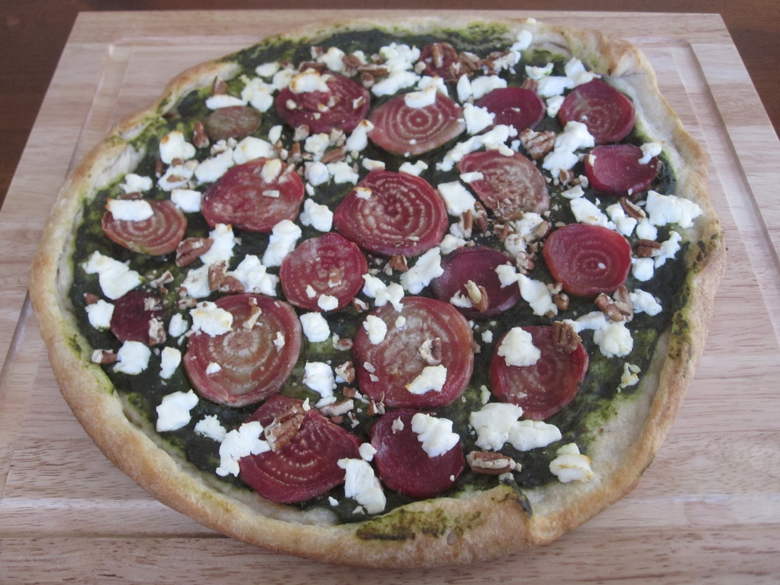 Beet Green Pesto Pizza with Roasted Beets and Goat Cheese