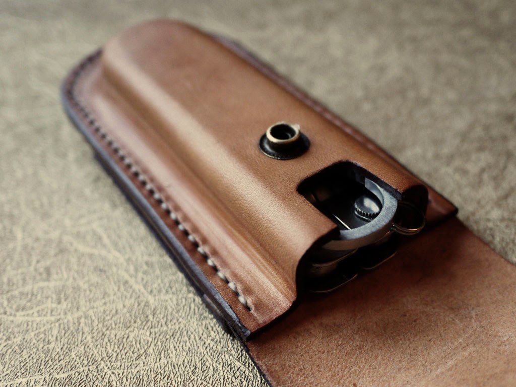 Audhumbla: Custom sheath for a Leatherman Super Tool & Burtek Pocketwrench
