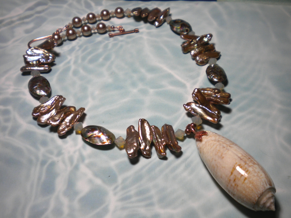 Del's Shells: Olive Shell, Pearl, and Abalone Necklace
